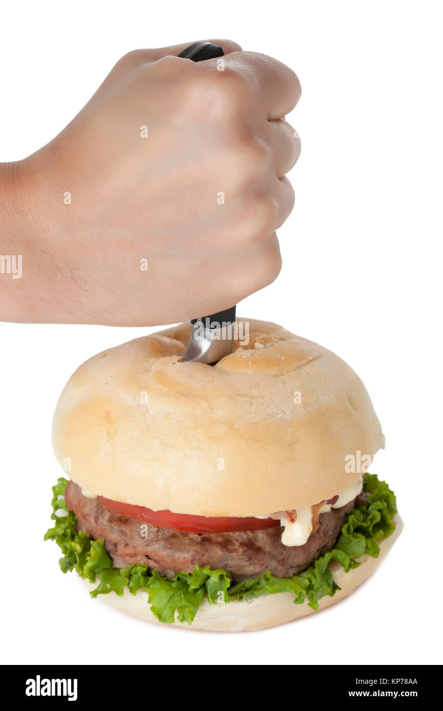 hand stabbing a hamburger Stock Photo - Alamy