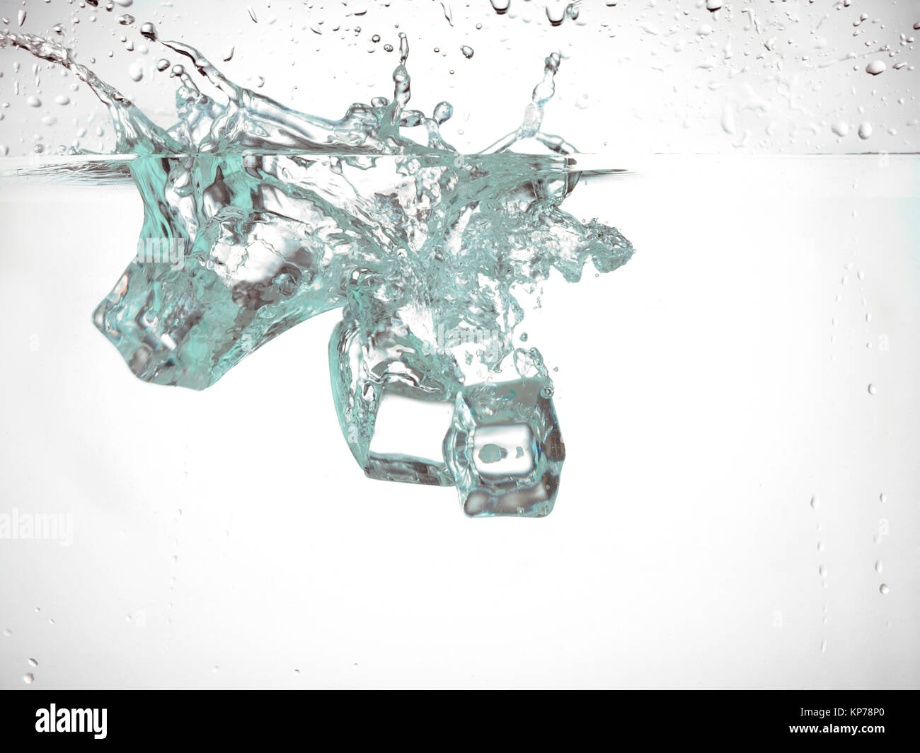 ice cube falling under the water Stock Photo - Alamy