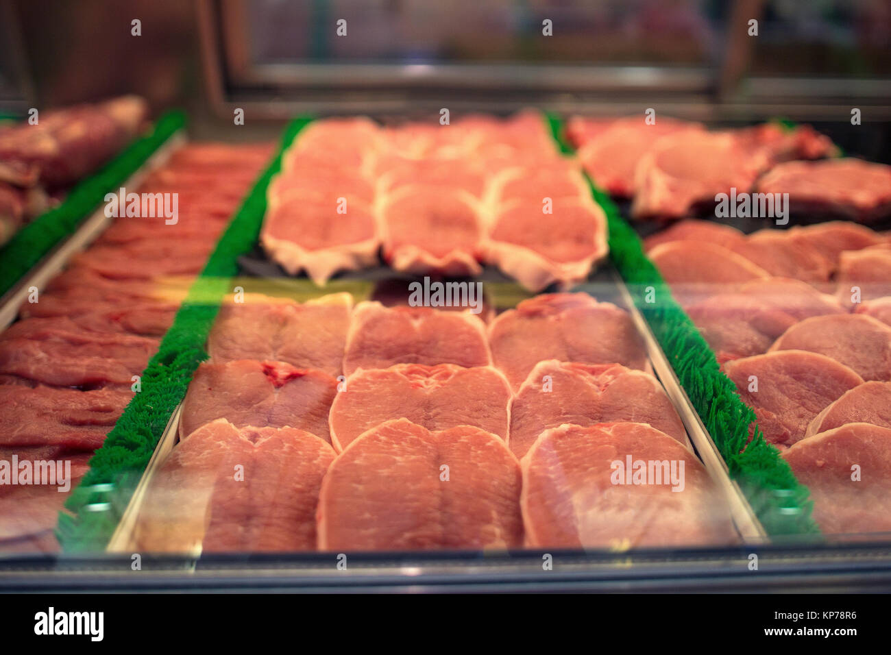 pork in display cabinet Stock Photo - Alamy