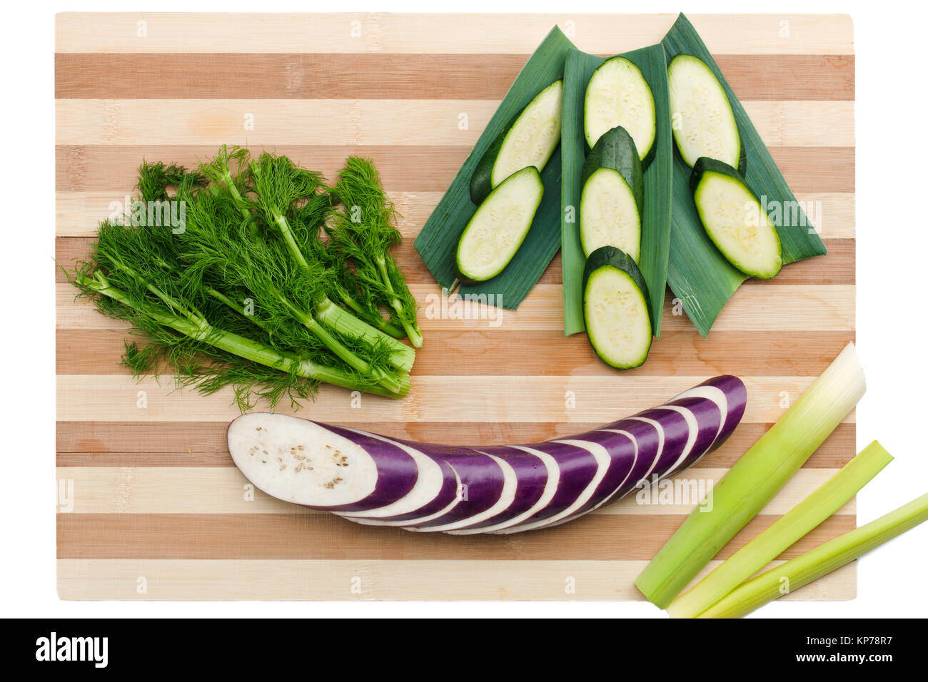 slices of vegetable on striped surface Stock Photo - Alamy