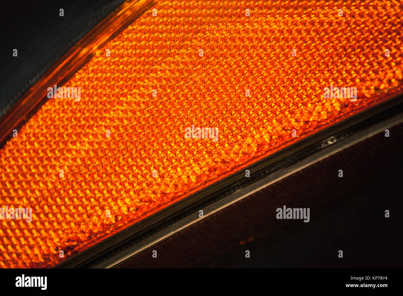 Modern car headlight fragment, orange cataphyte pattern Stock Photo - Alamy