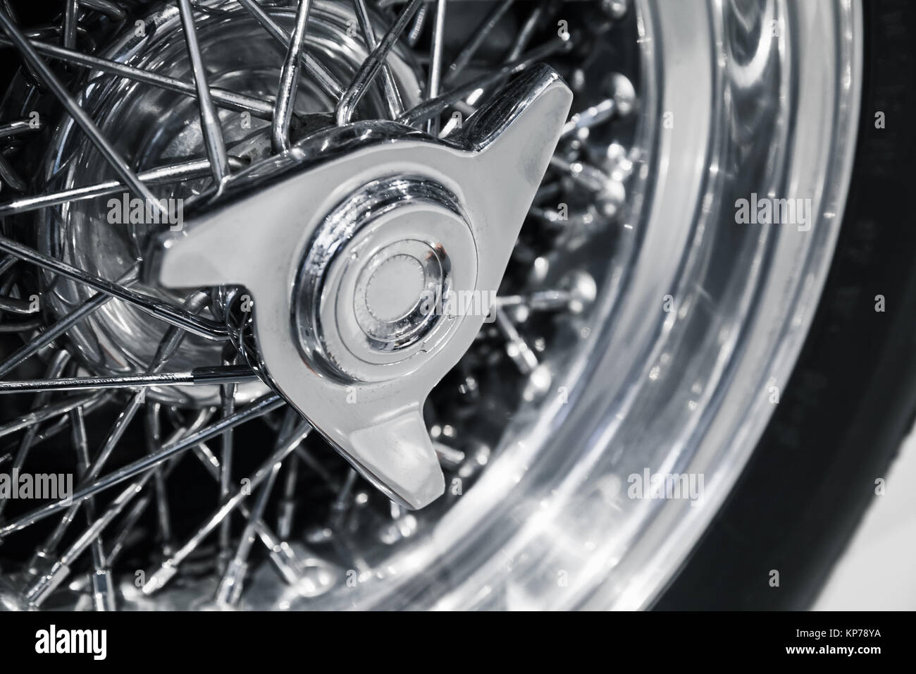 Chromed wheel disc. Luxury Italian vintage sport car fragment, close up ...