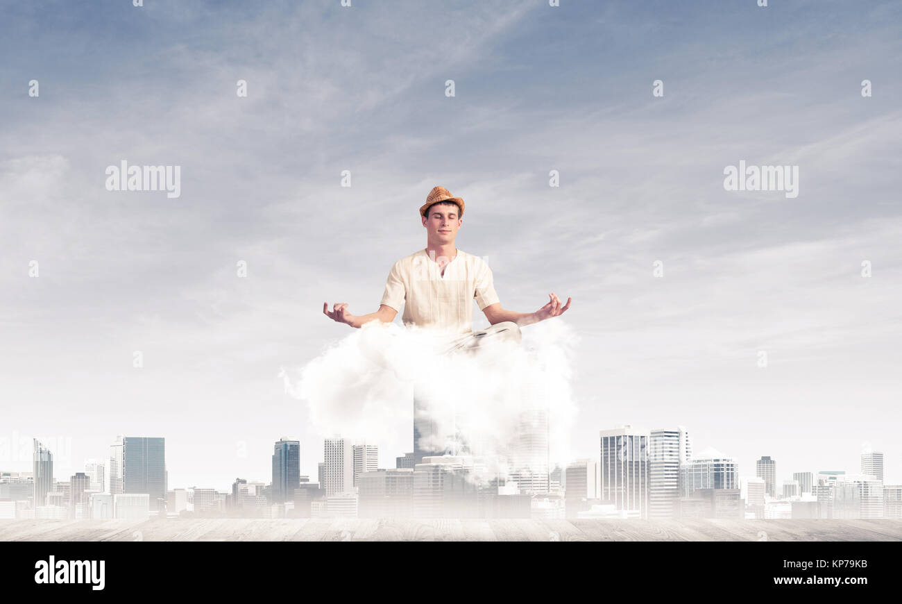 Young man keeping mind conscious Stock Photo - Alamy