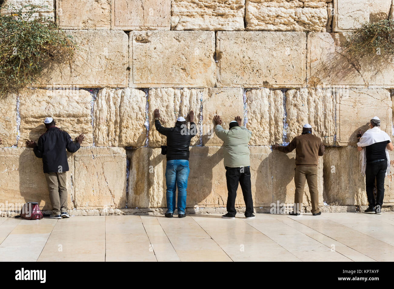 JERUSALEM, ISRAEL - 22 NOVEMBER 2017: Pilgrims pray at the wall of the ...