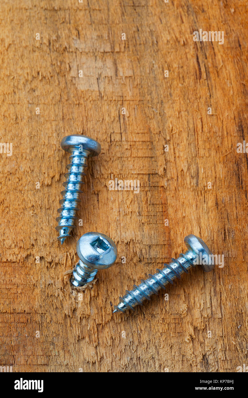 screws in wood Stock Photo - Alamy