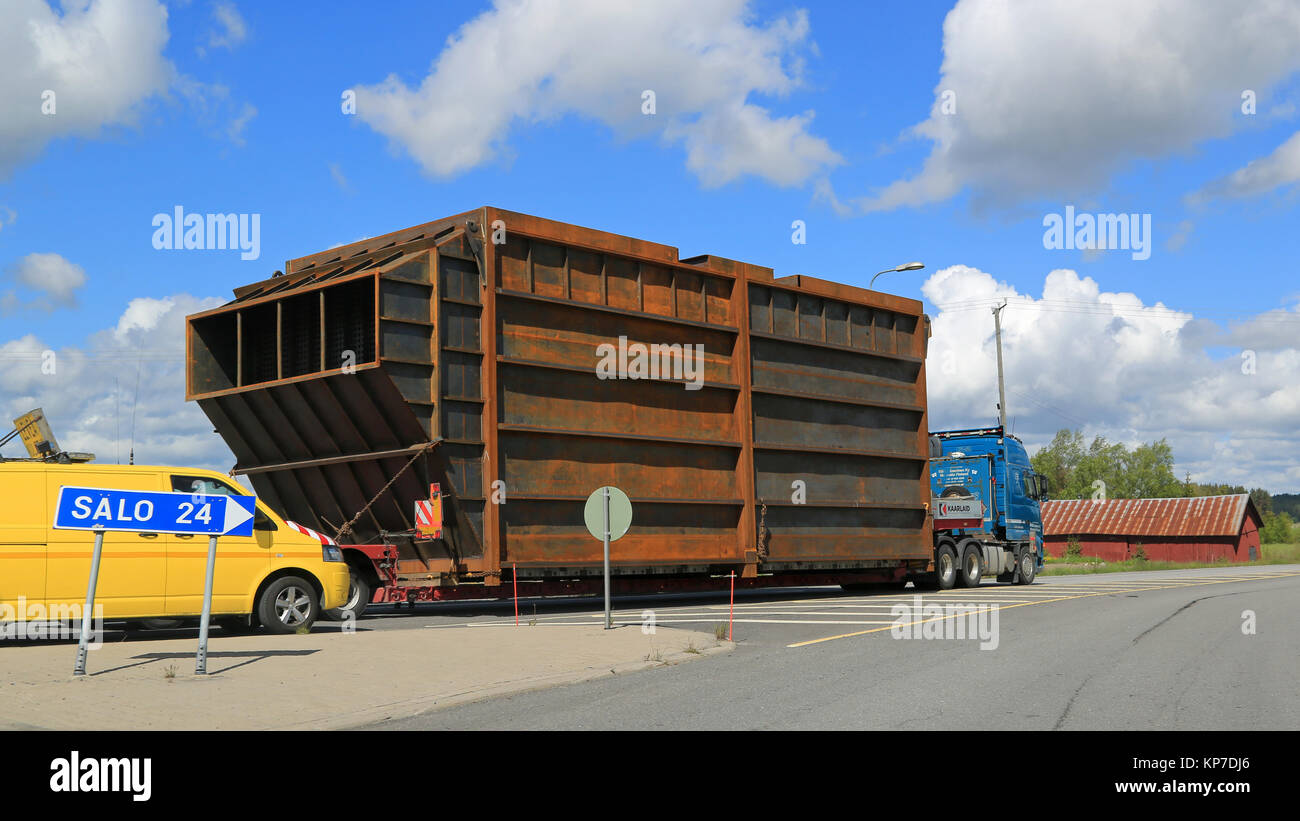 SALO, FINLAND - MAY 31, 2015: Pilot cars stop traffic to lead a wide ...