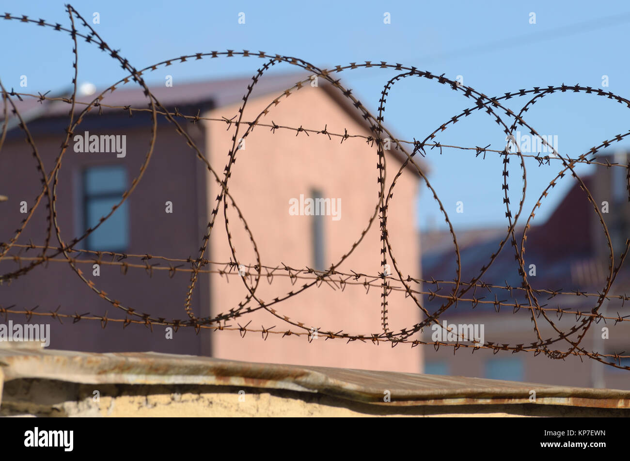 Barbed wire on the prison walls.It serves as a barrier from escaping ...