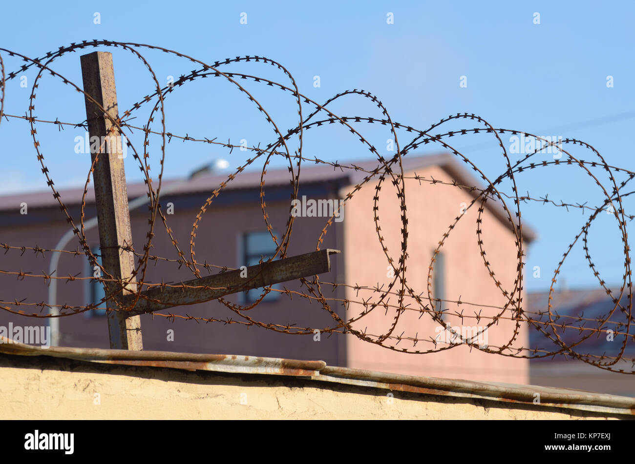 Barbed wire on the prison walls.It serves as a barrier from escaping ...