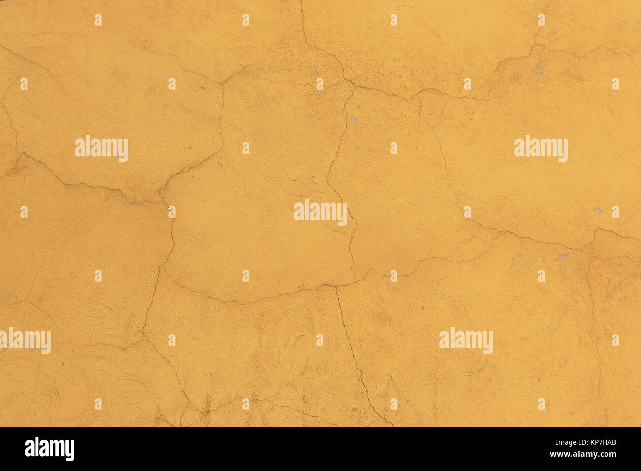 Old cracked yellow wall as texture, wallpaper or background Stock Photo ...