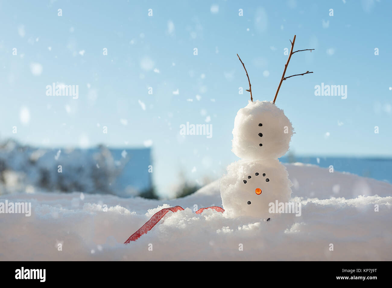 Cheerful snowman doing a handstand in the snow - landscape version ...