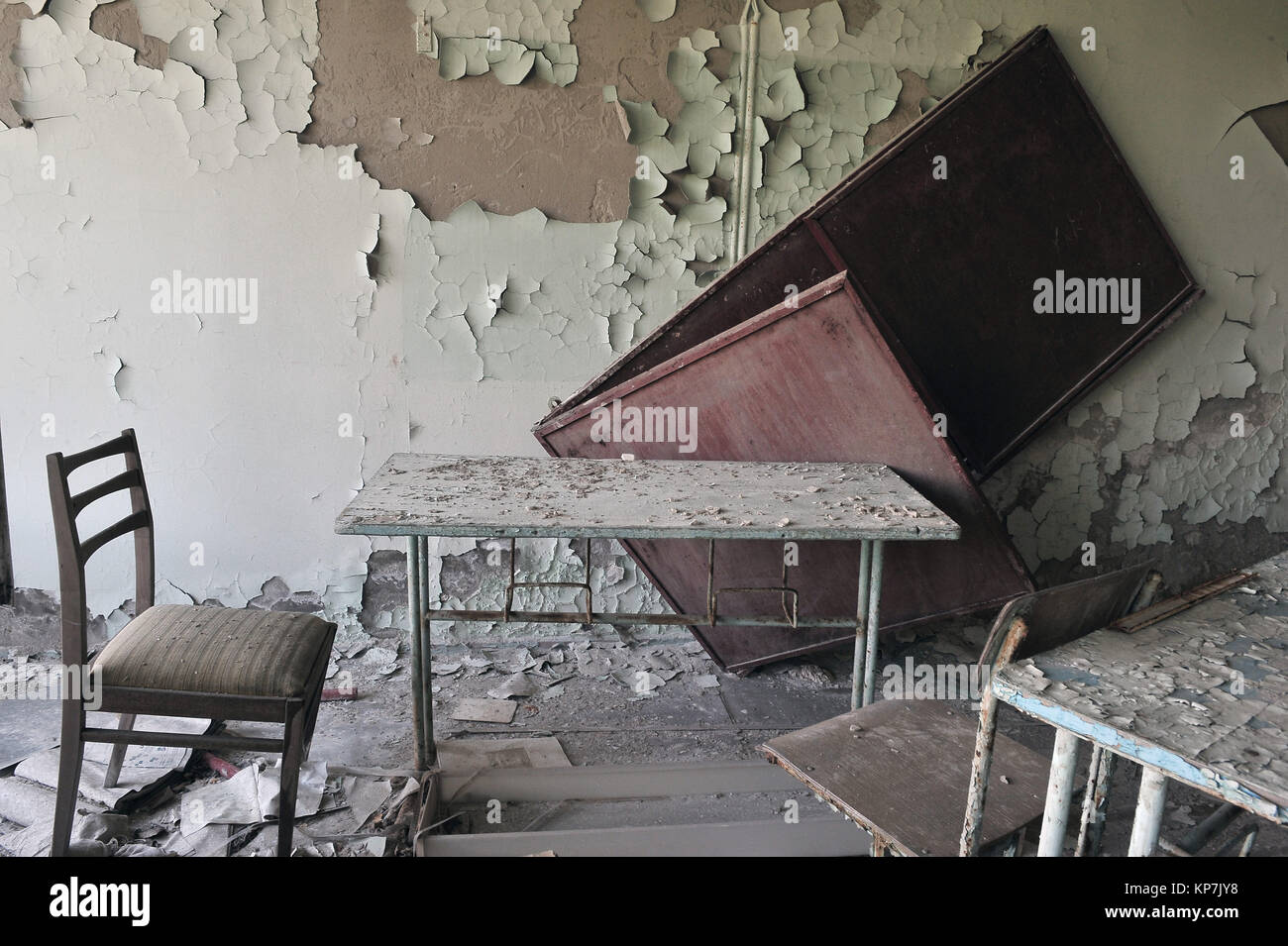 Destroyed classroom in the abandoned school in Pripyat, the board fell ...