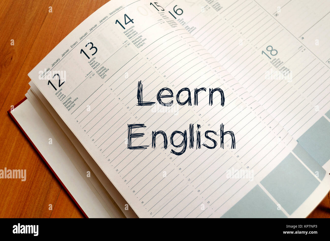 Learn english write on notebook Stock Photo - Alamy