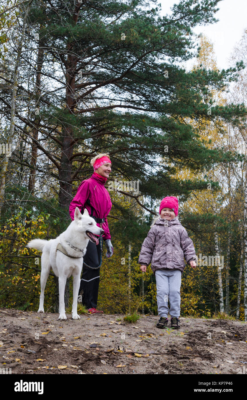 Granny granddaughter dog walk in hi-res stock photography and images ...