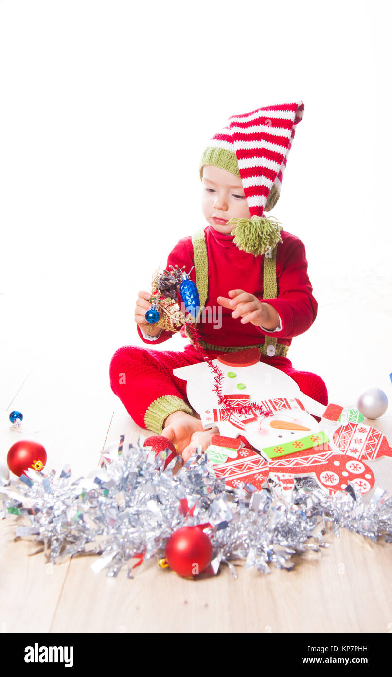 Baby boy dressed as elf Stock Photo - Alamy