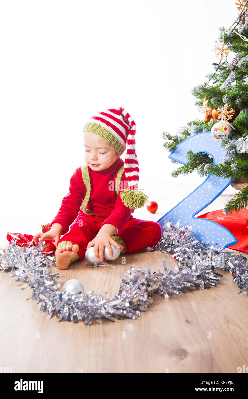 Baby boy dressed as elf Stock Photo - Alamy