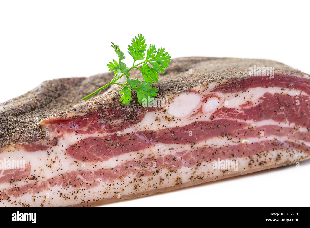 Corsican traditional delicatess smoked piece of pork or boar belly on a ...