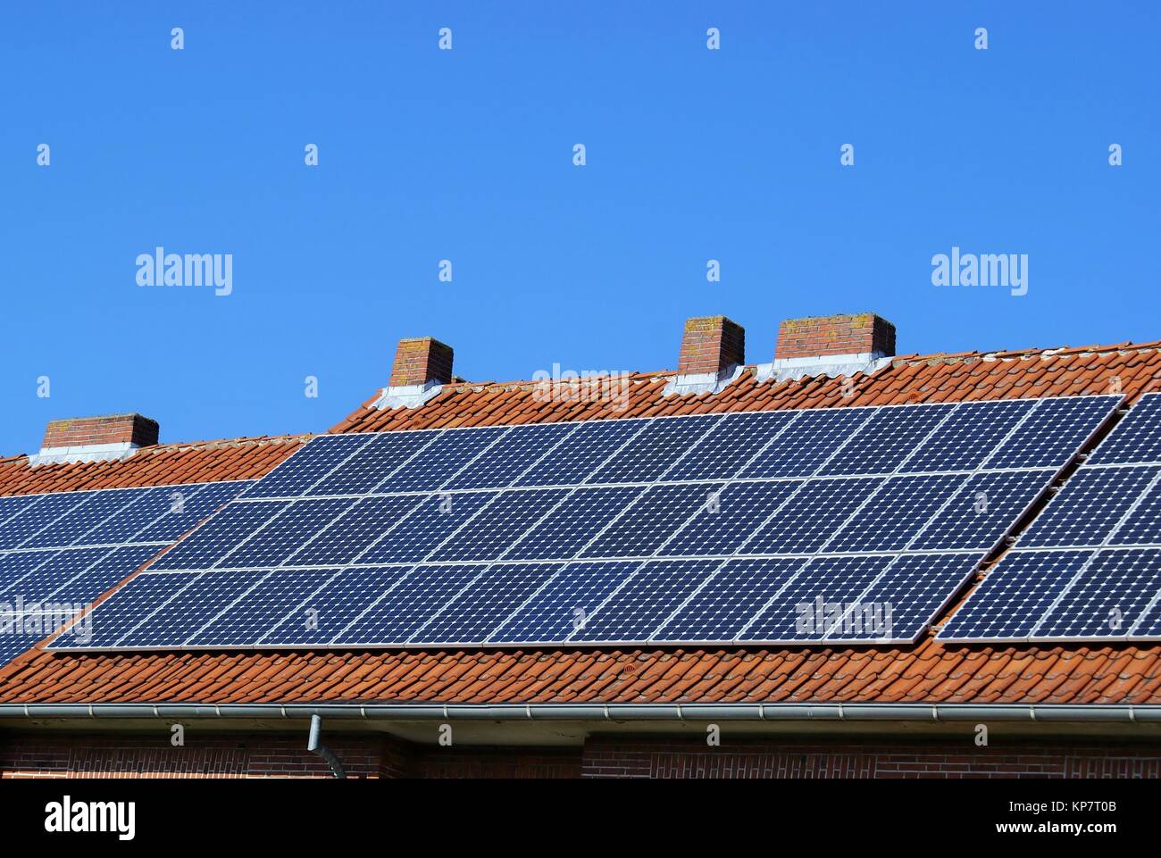 large solar system on a roof Stock Photo - Alamy