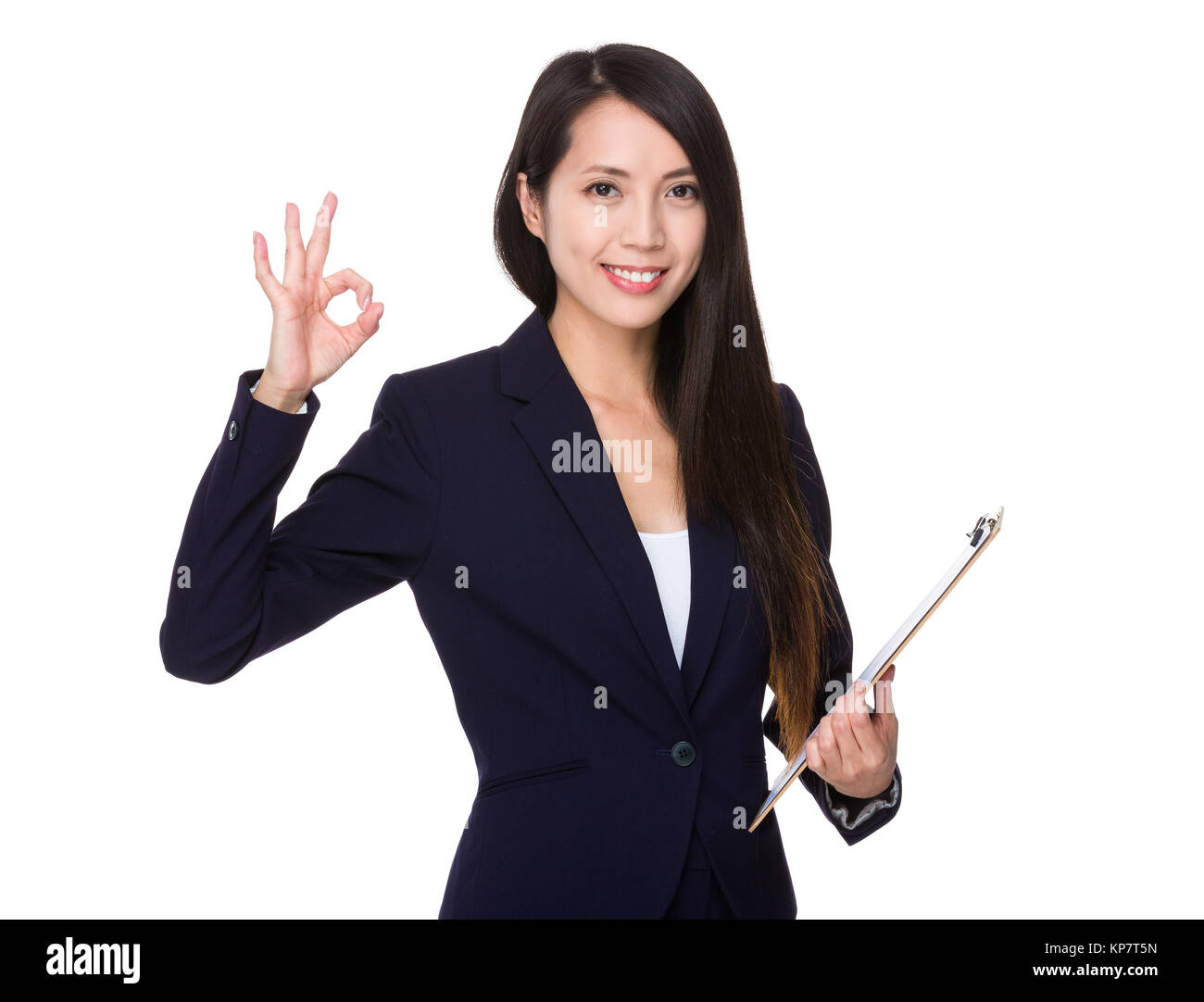 Businesswoman hold with clipboard and ok sign gesture Stock Photo - Alamy