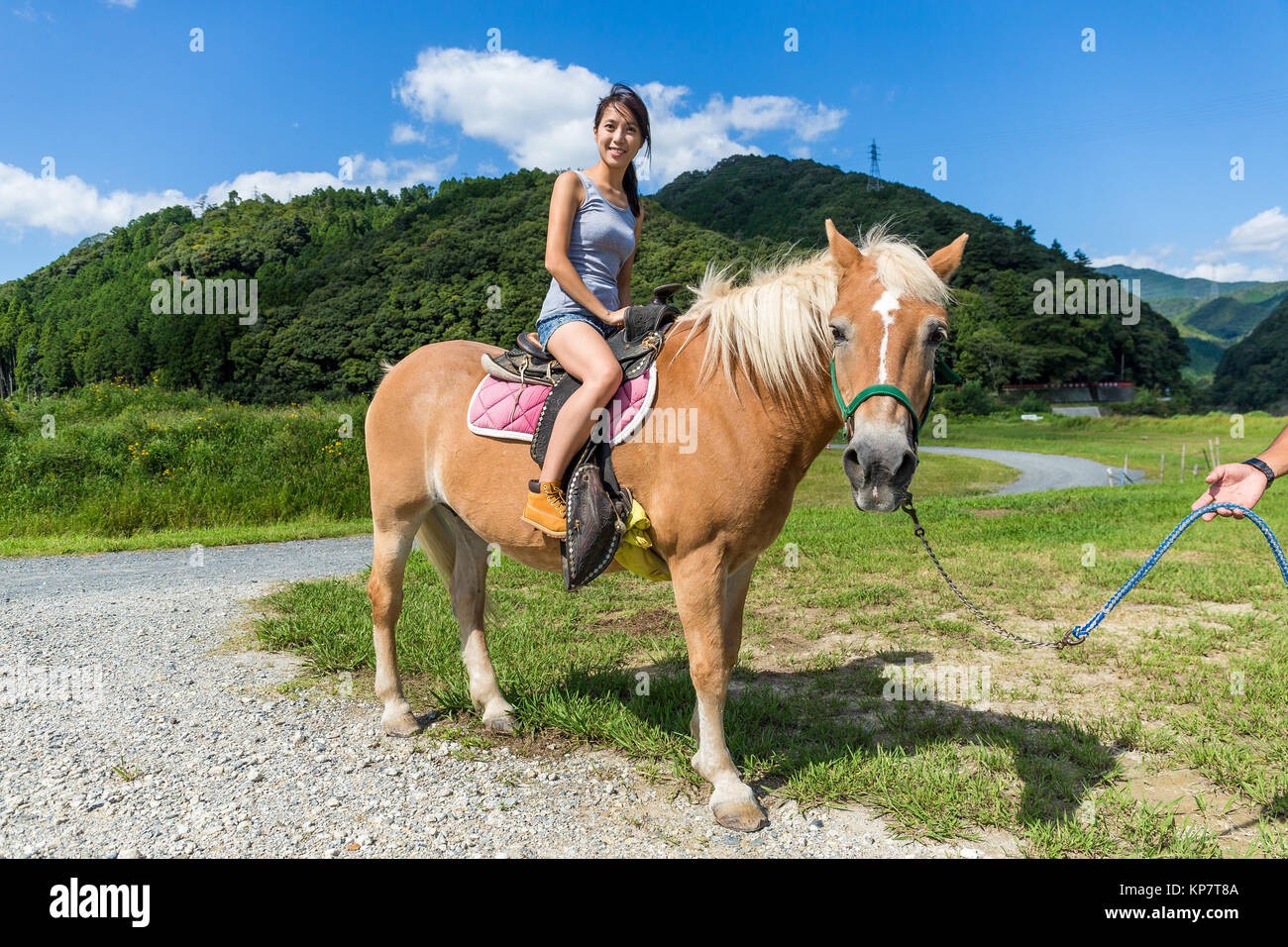 Chinese young woman riding horse hi-res stock photography and images ...