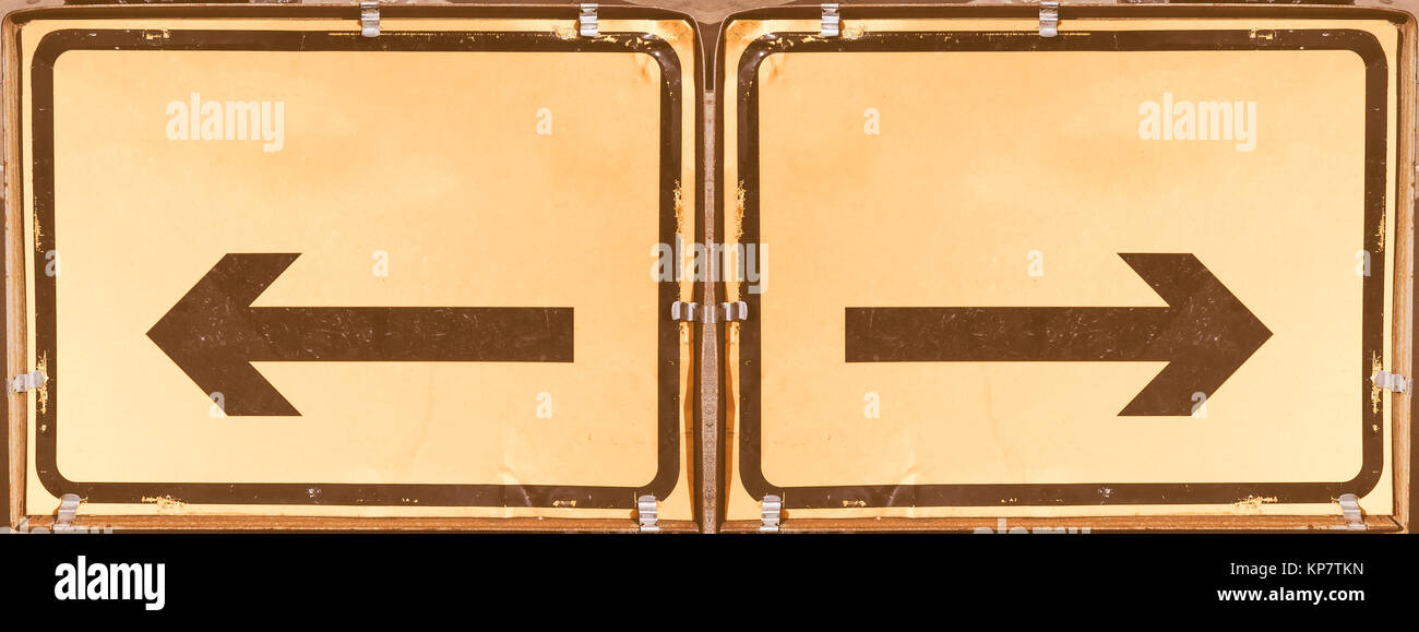 Direction arrow sign vintage Stock Photo - Alamy