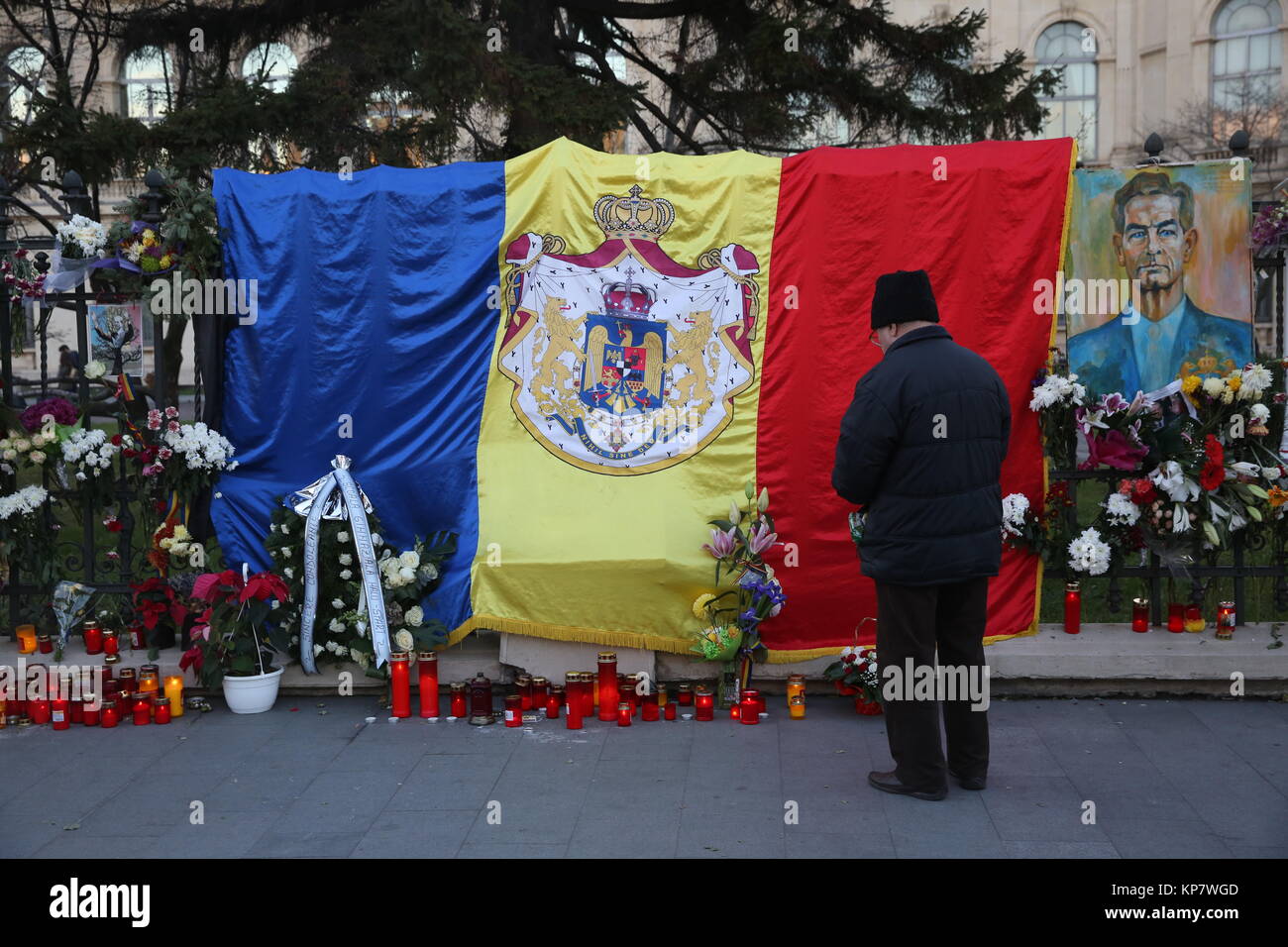 BUCHAREST, ROMANIA - December 09, 2017: Citizens are bringing flowers ...
