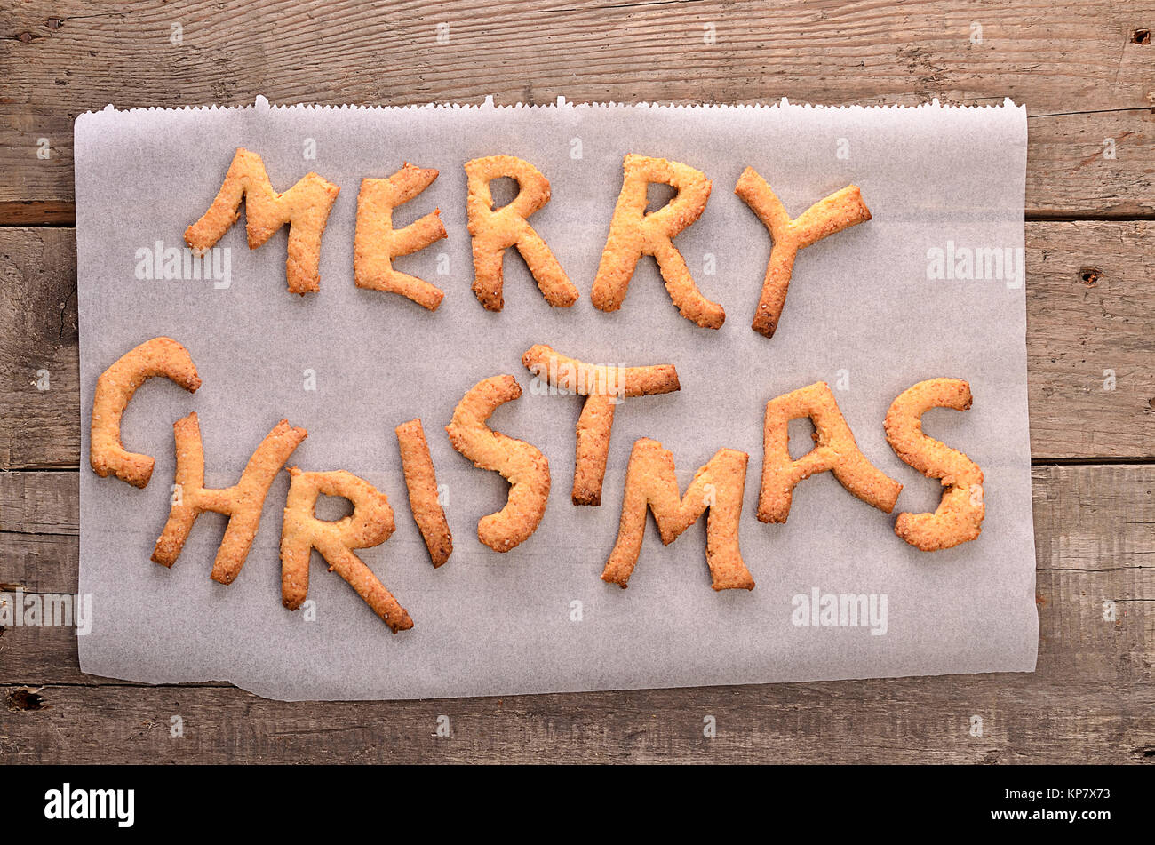 Sweet Merry Christmas background on an old wood plank Stock Photo - Alamy