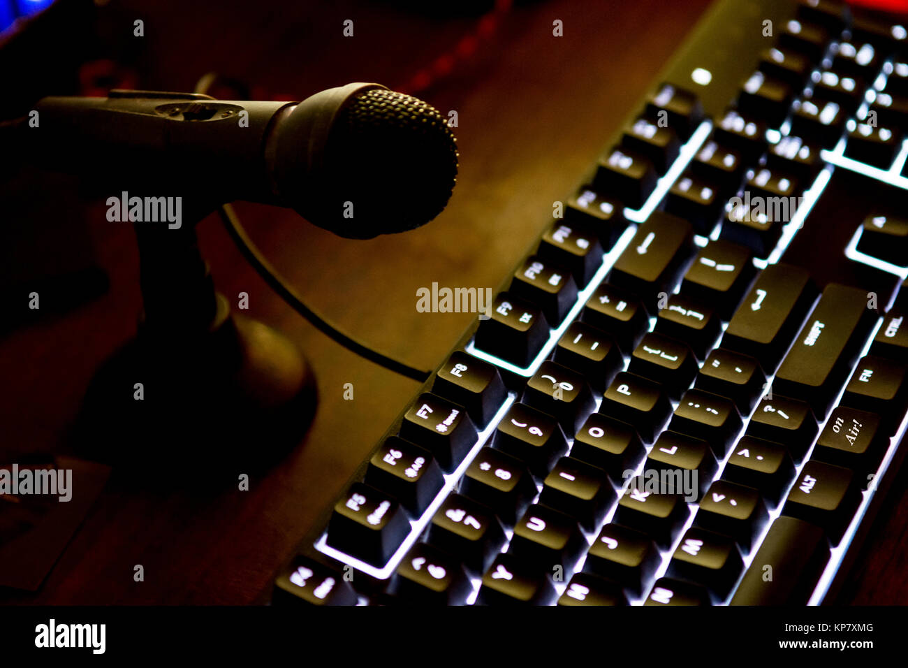 illuminated computer keyboard with microphone Stock Photo - Alamy