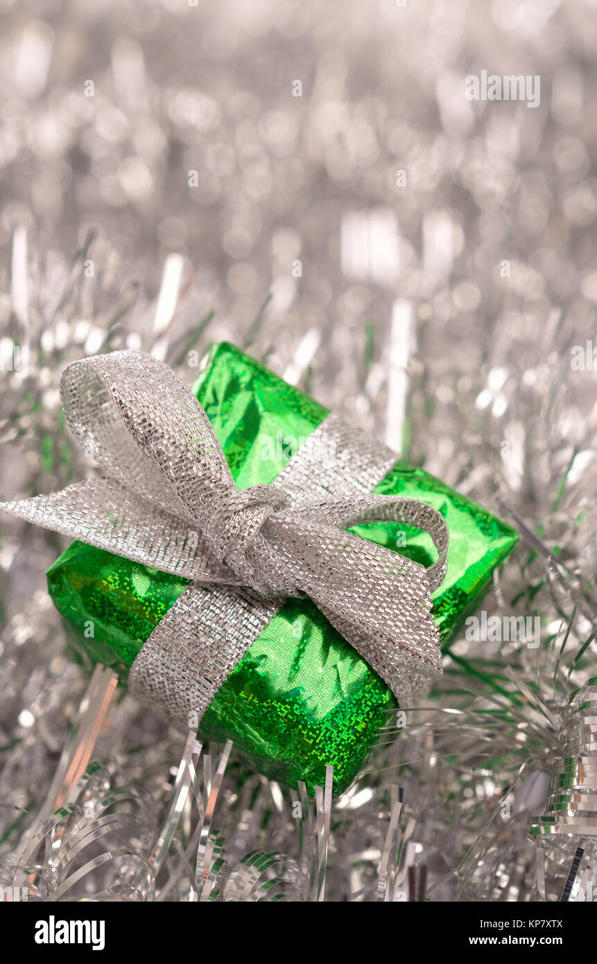 Green Christmas present Stock Photo - Alamy