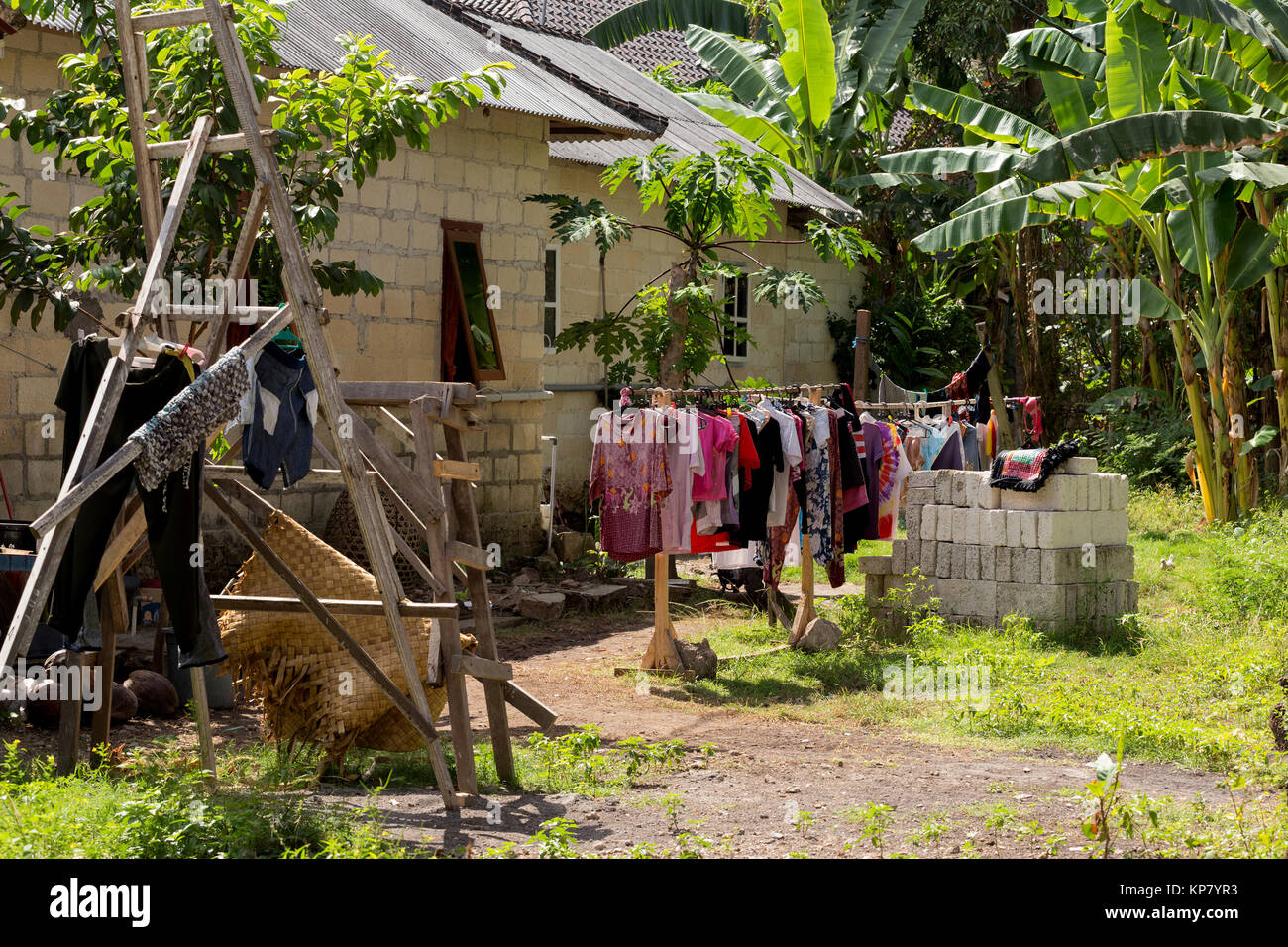 Washed clothes drying outside Stock Photo - Alamy