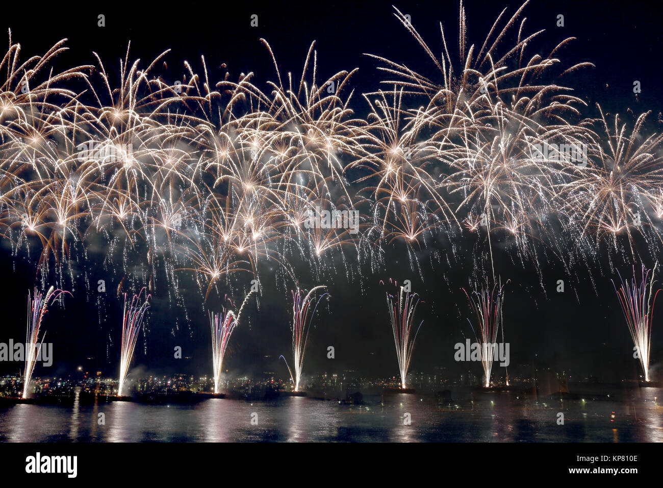fireworks reflect on sea water Stock Photo - Alamy