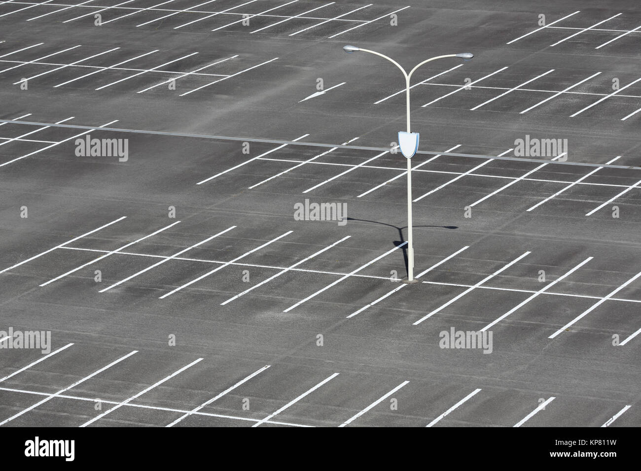 Empty car parking lot with light pole Stock Photo - Alamy
