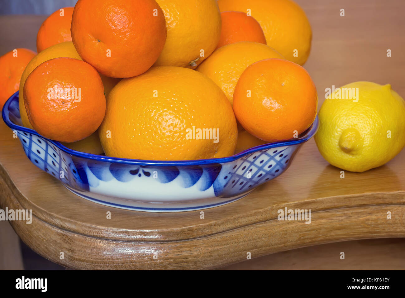 Oranges and tangerines in a beautiful ceramic vase Stock Photo - Alamy