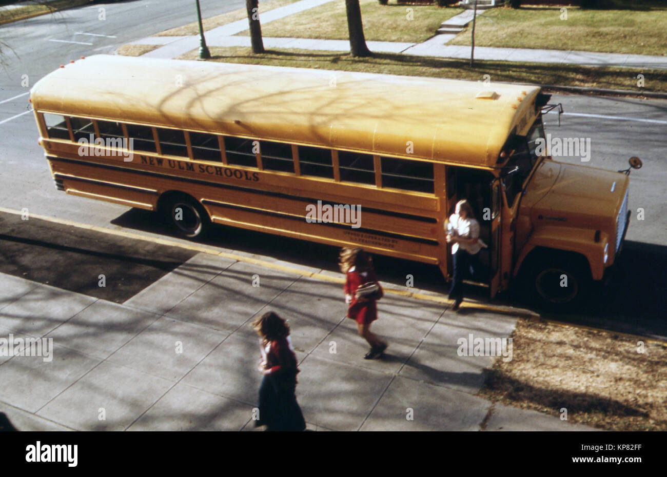 Students arrive for school in a school bus in New Ulm, Minnesota in the ...