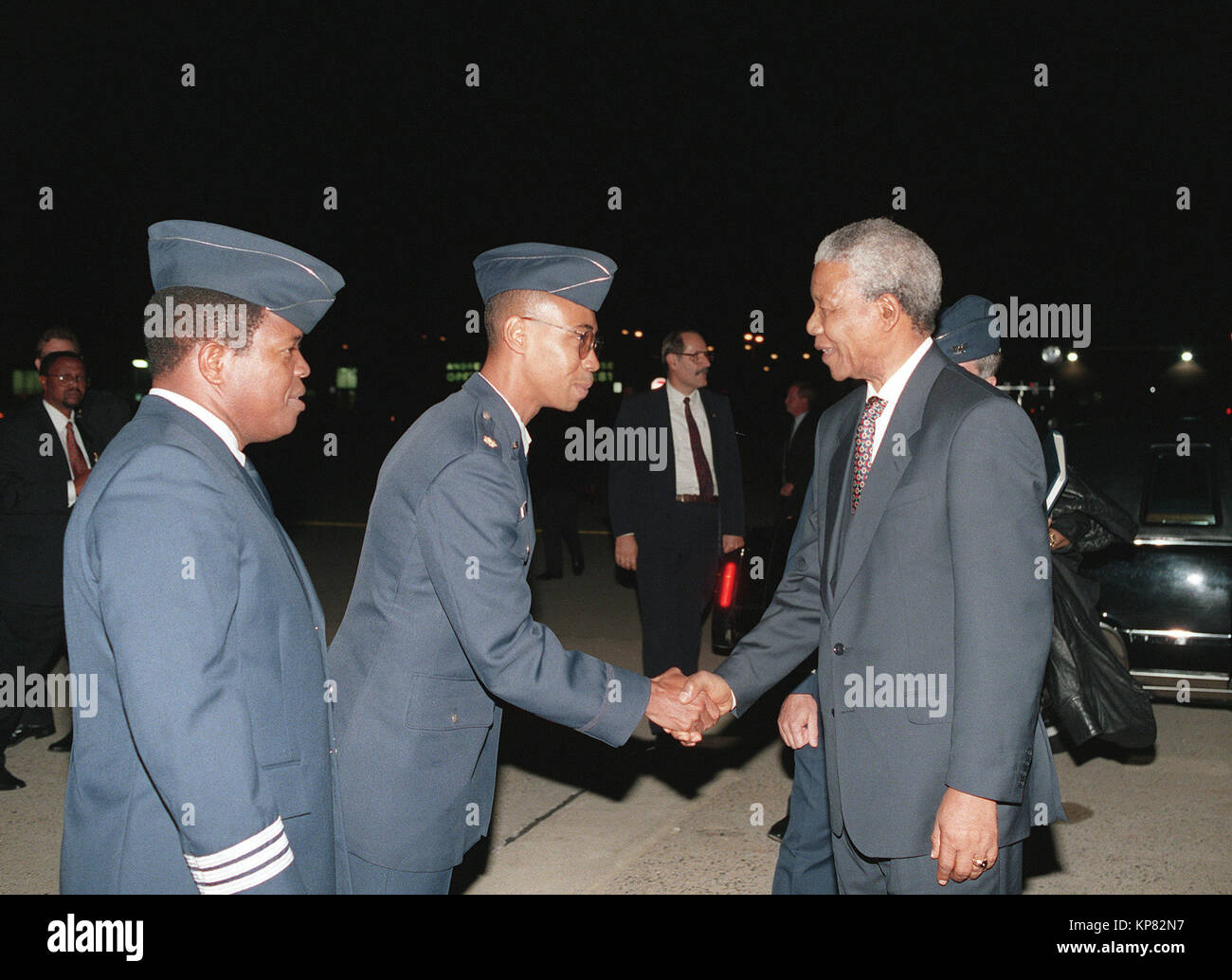 Protocol Officers greet South African President Nelson Mandela on the ...