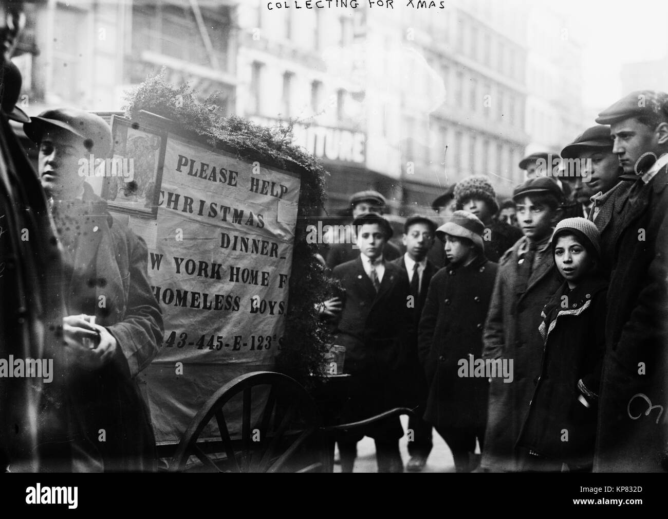 Collecting money for New York City home for homeless boys charity Stock ...