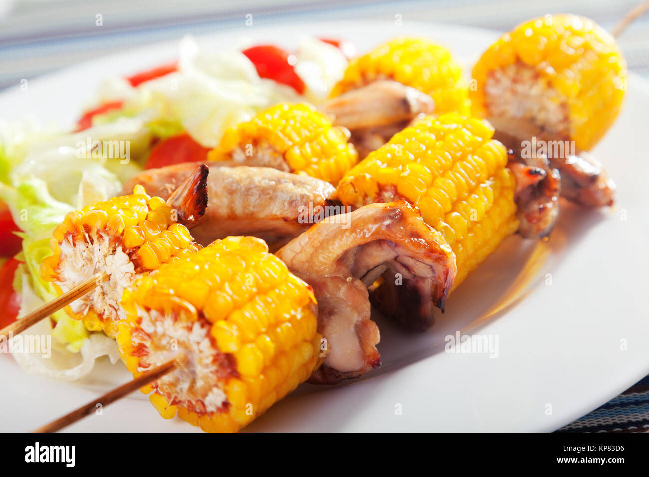 Chicken wings with corn skewers,Chicken wings with corn skewers Stock ...