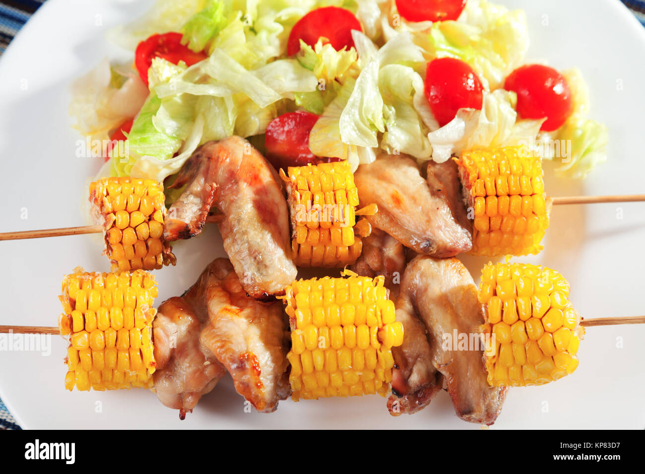 Chicken wings with corn skewers,Chicken wings with corn skewers Stock ...