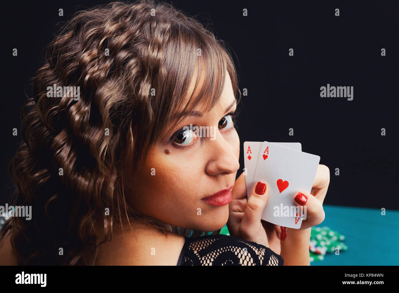 Young woman playing poker,Young woman playing poker,Young woman playing ...