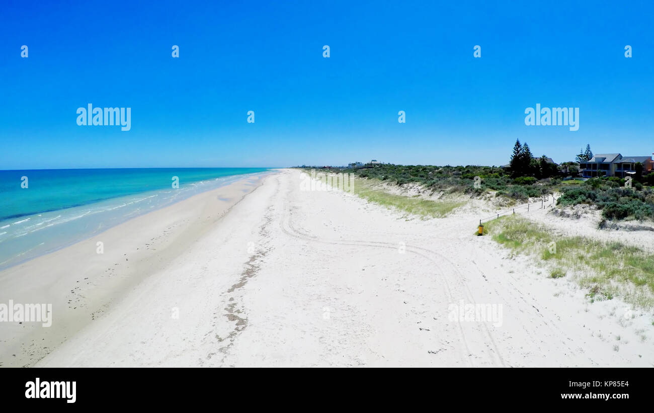 Drone aerial view of wide open white sandy beach, taken at Tennyson ...