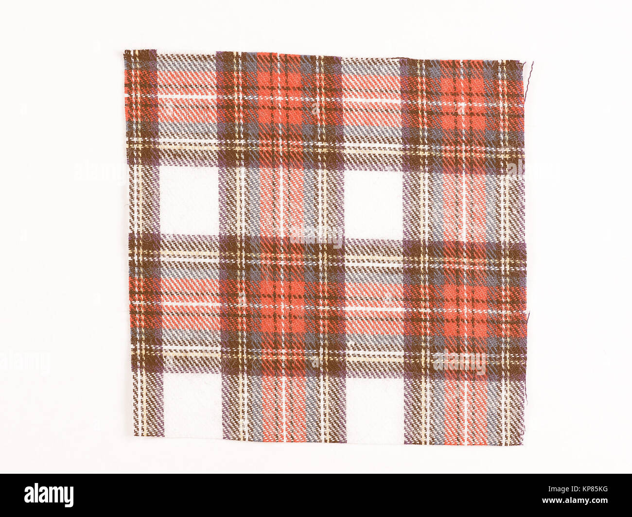 Tartan fabric swatch over white background vintage Stock Photo - Alamy