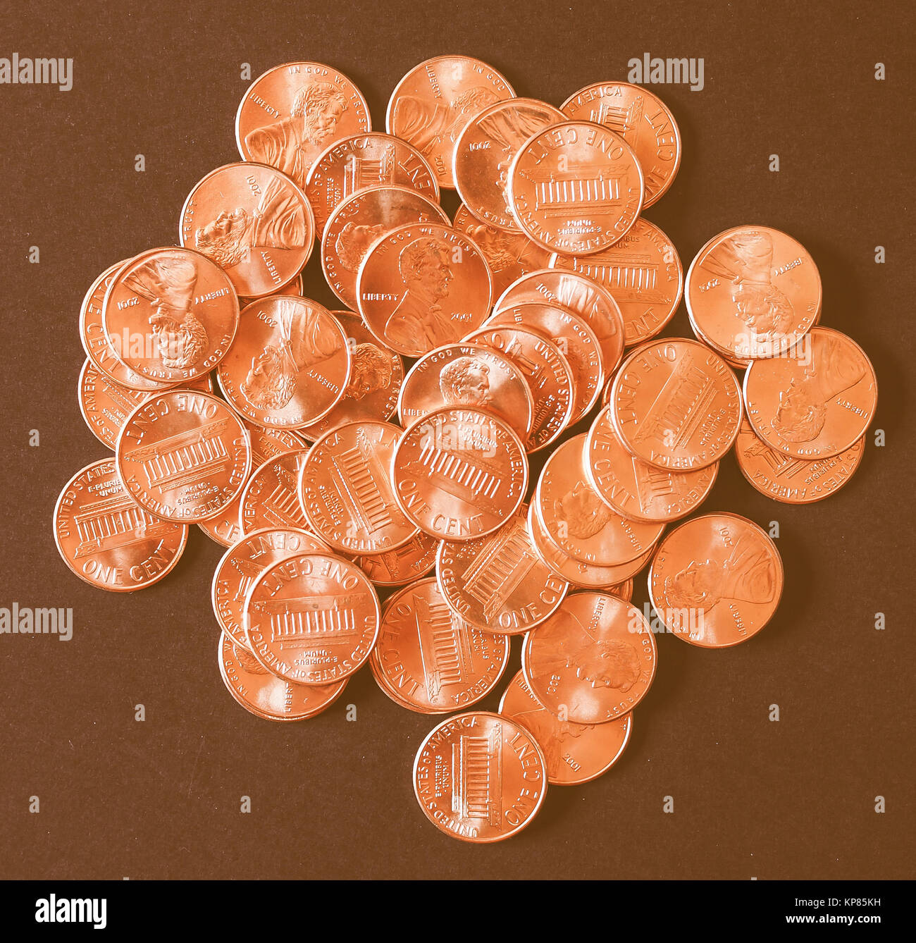 One cent wheat penny coin currency of the United States over black ...