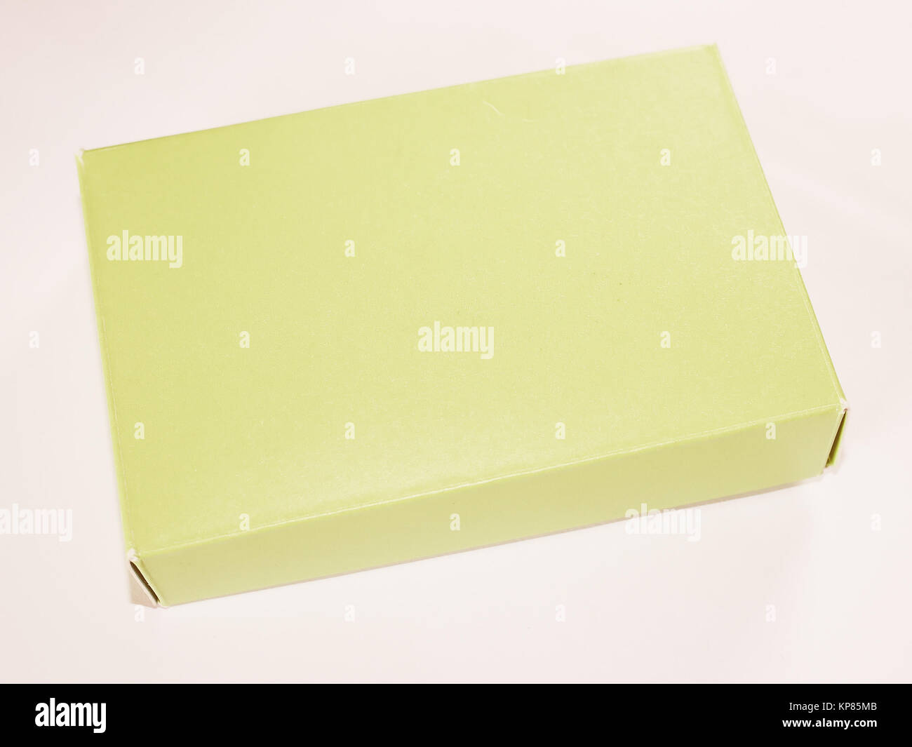 Green yellow paper box packet vintage Stock Photo - Alamy