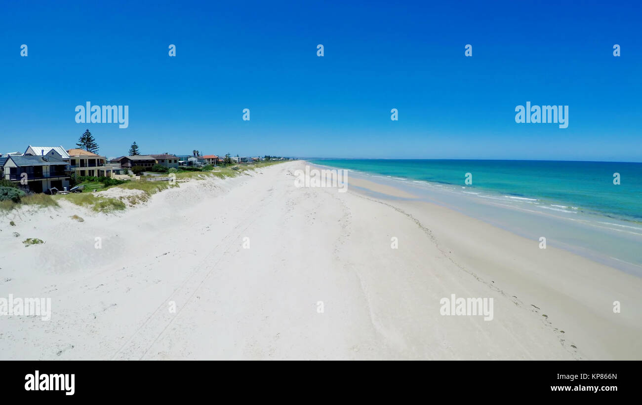Drone aerial view of wide open white sandy beach, taken at Tennyson ...
