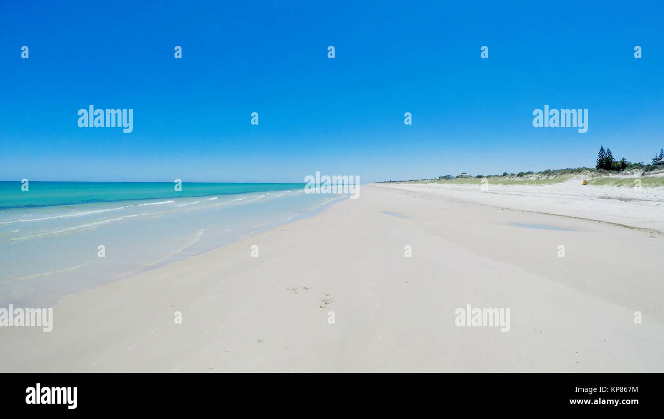 Drone aerial view of wide open white sandy beach, taken at Tennyson ...