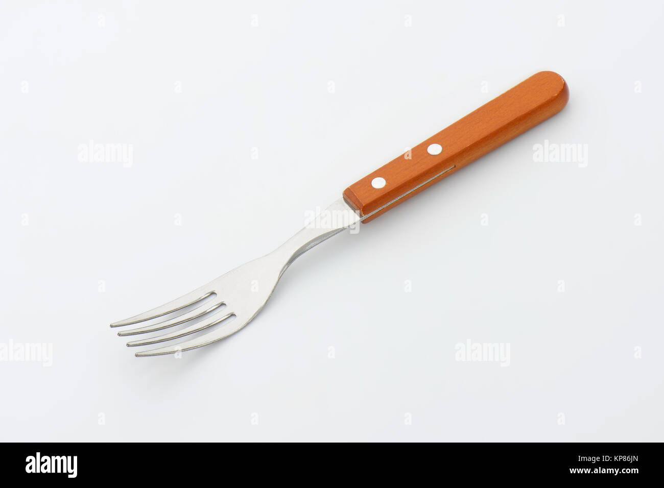 Wooden-handled dinner fork Stock Photo - Alamy