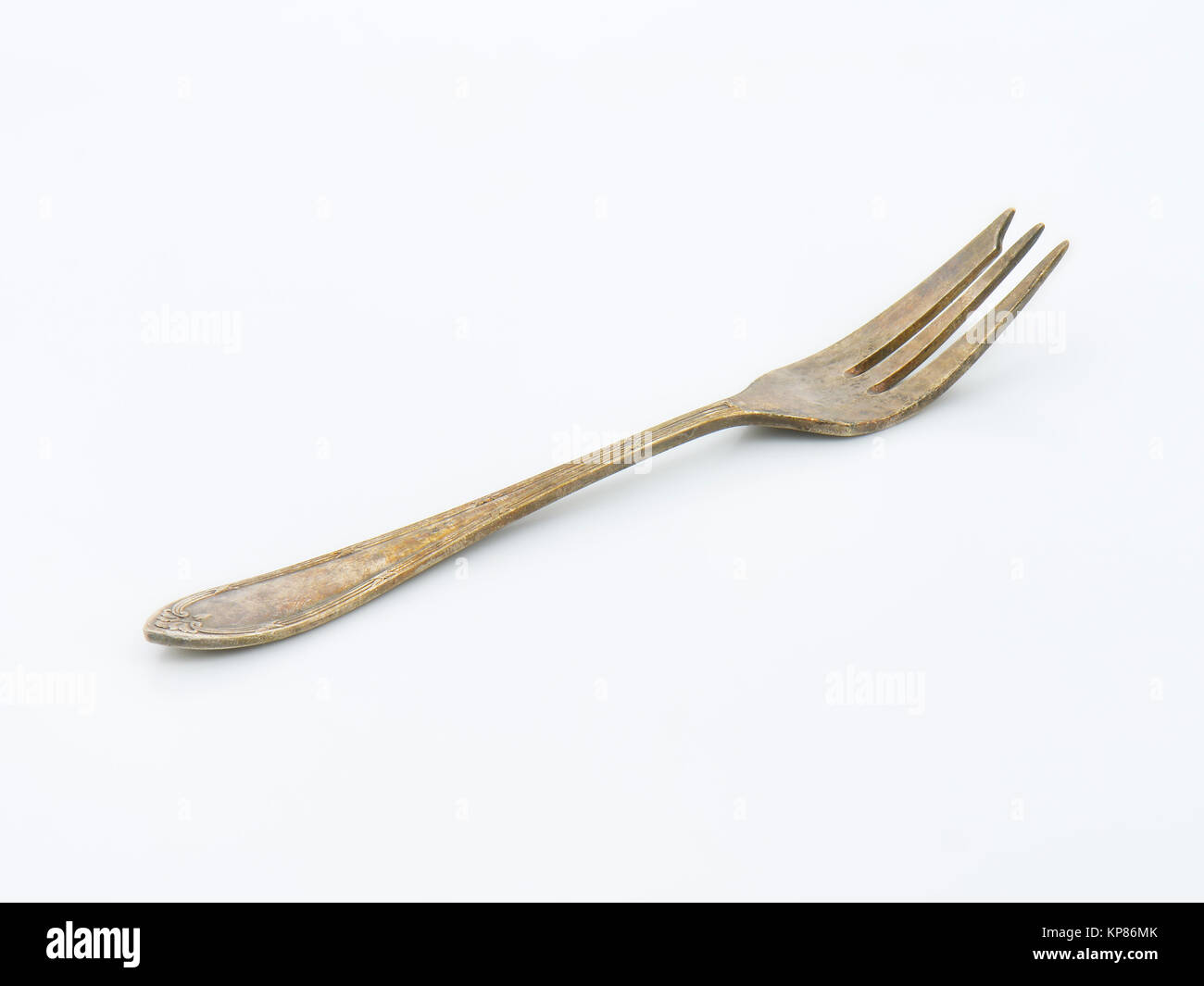 Vintage pastry fork Stock Photo - Alamy