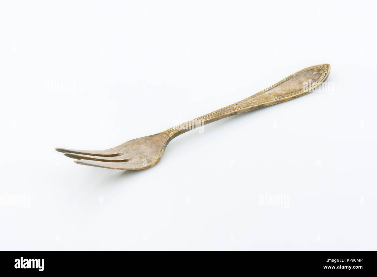 Three-tine pastry fork Stock Photo - Alamy