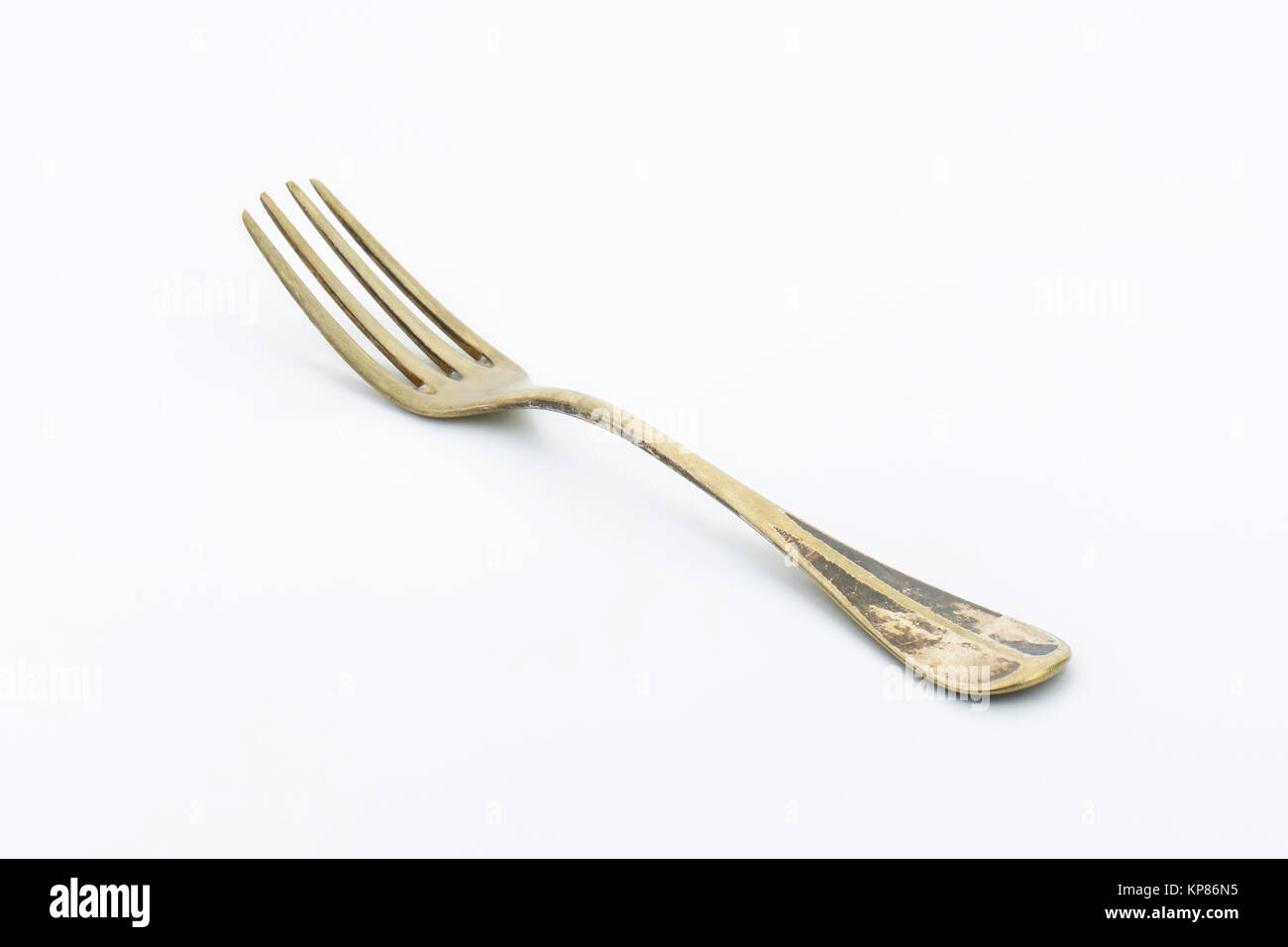 Old rusty dinner fork Stock Photo - Alamy
