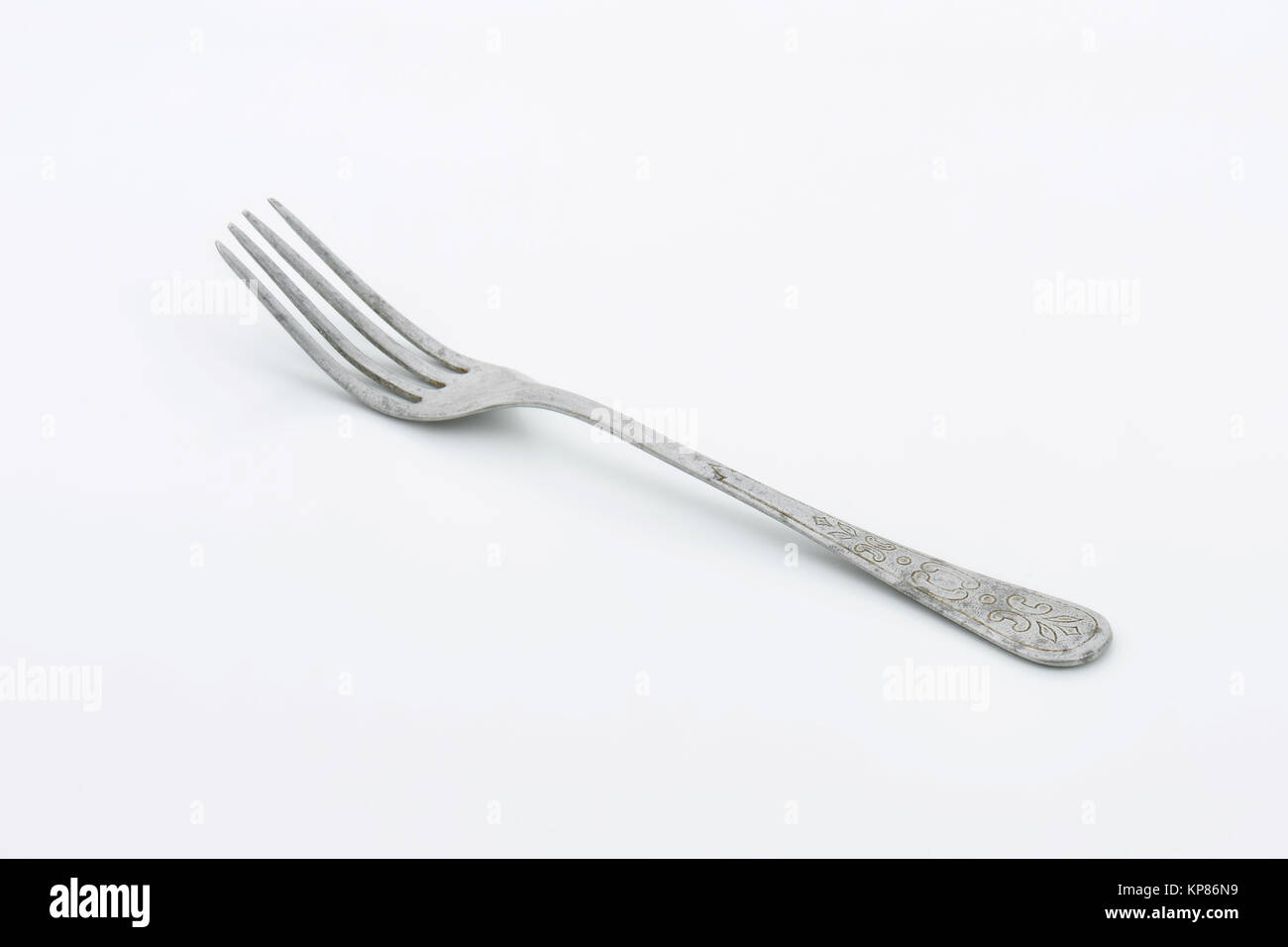 Old dinner fork Stock Photo - Alamy