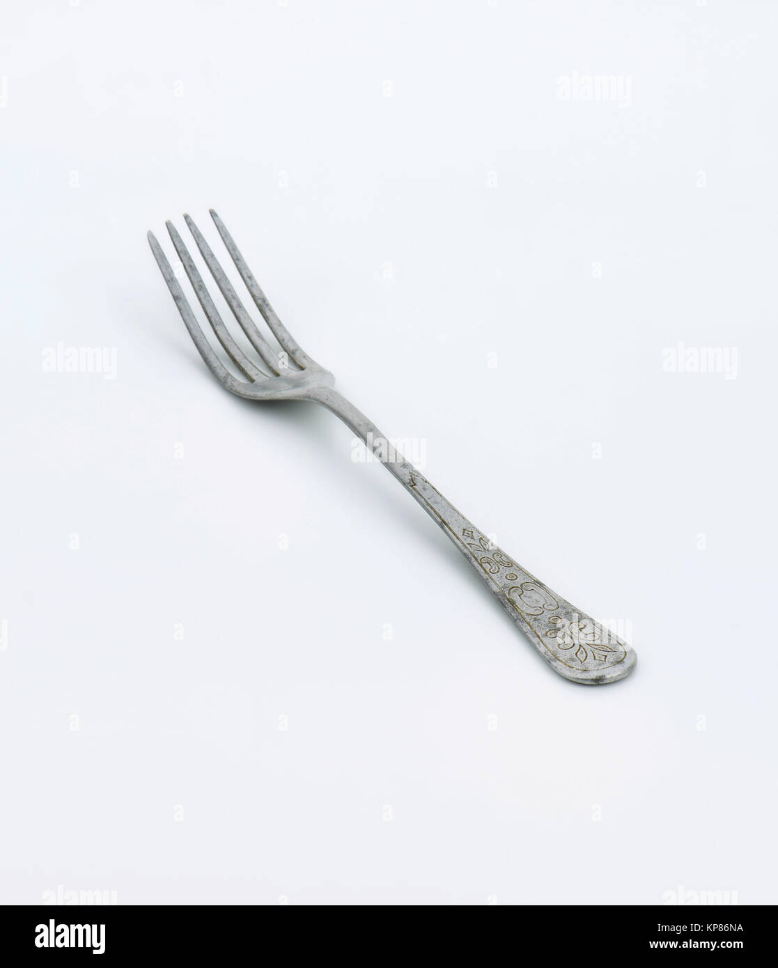 Old dinner fork Stock Photo - Alamy